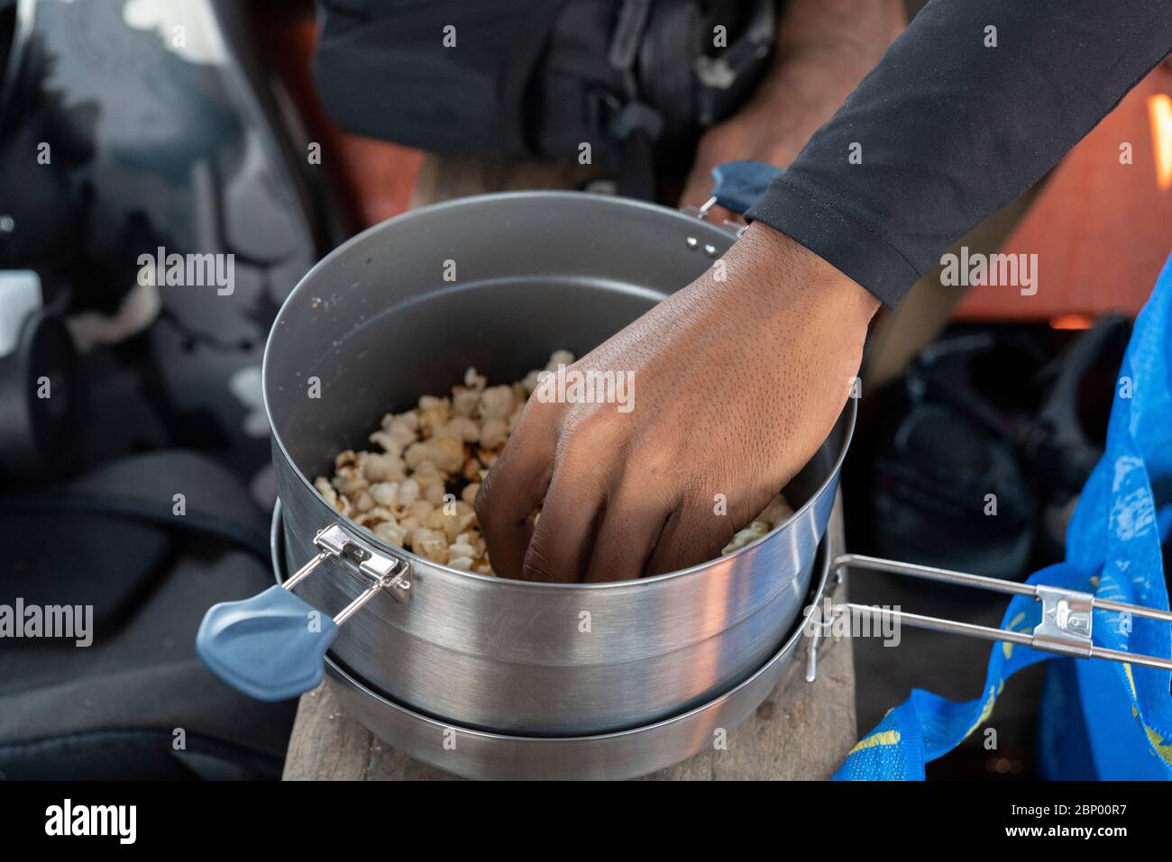 Making pop corn on boat Stock Photo - Alamy