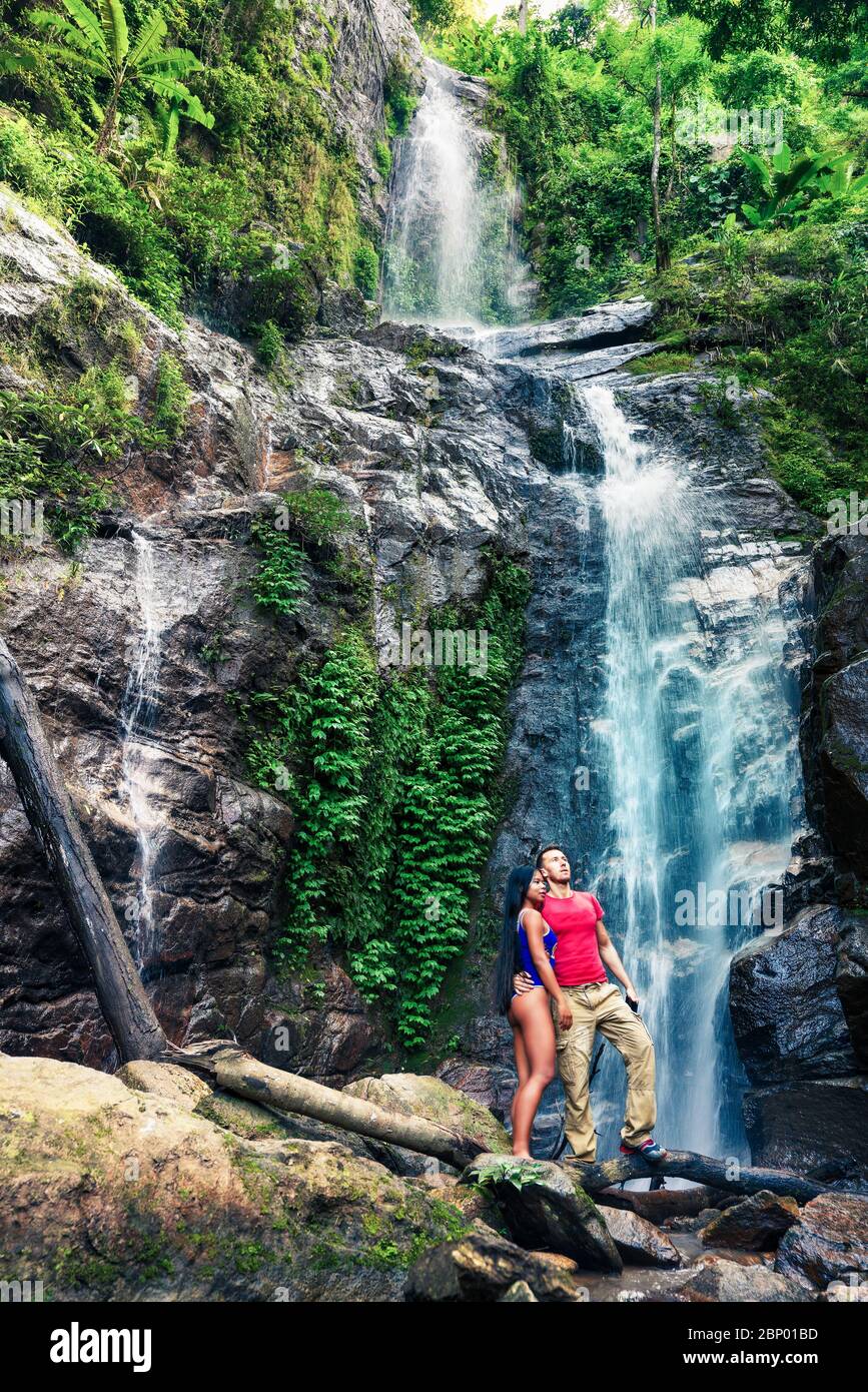 Loving couple by the waterfall Stock Photo - Alamy
