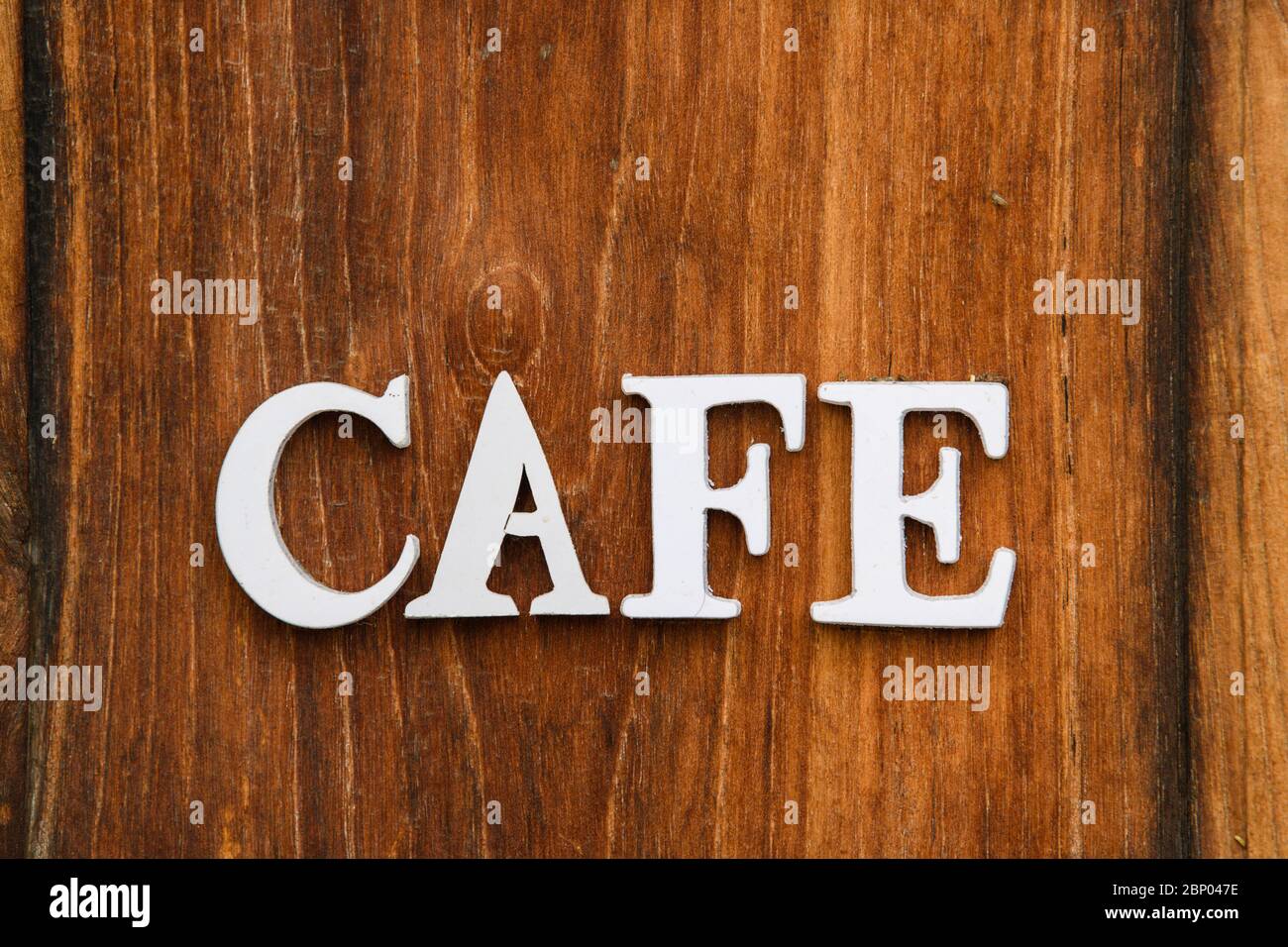 Craft cafe word, made of wooden, on wooden wall Stock Photo - Alamy