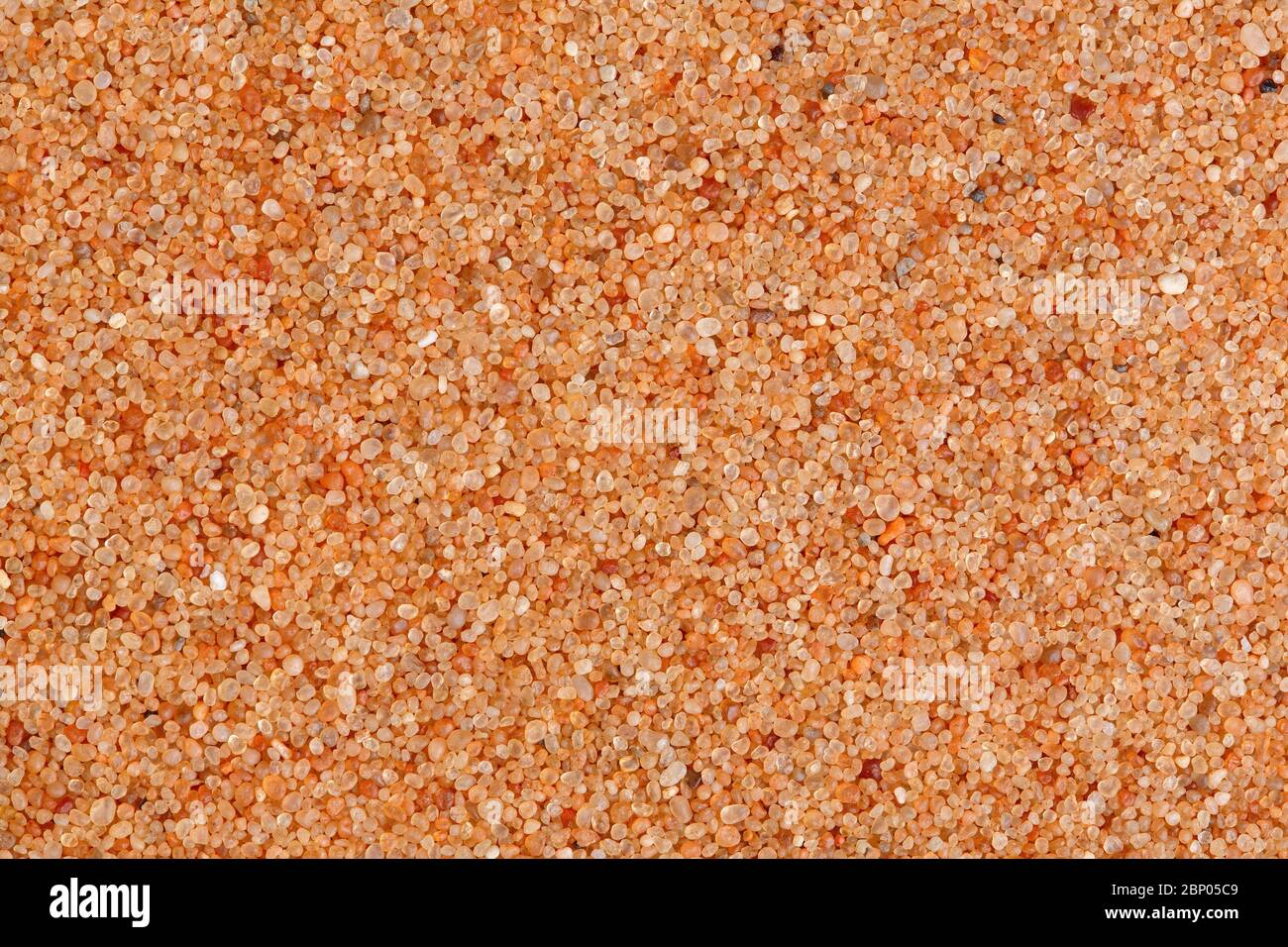 Natural orange sea sand. Can be used as background in art projects ...