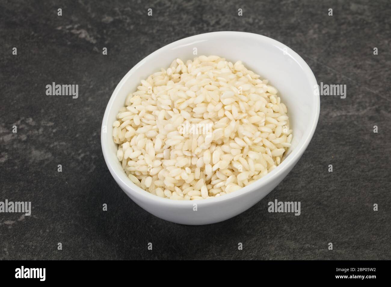 Raw Arborio rice for Italian risotto Stock Photo - Alamy