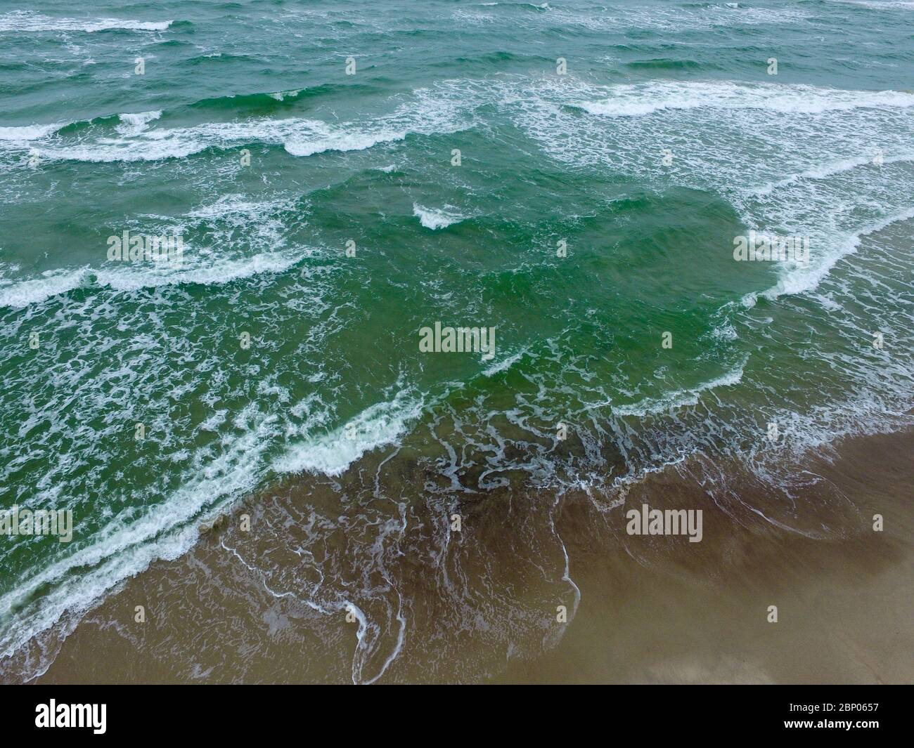 Top view of cold stormy and harsh Baltic sea. Empty off-season beach ...