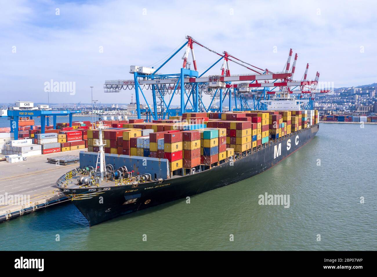 MSC Mega Container Ship docked at port during loading and unloading ... MSC Mega Container Ship docked at port during loading and unloading ...