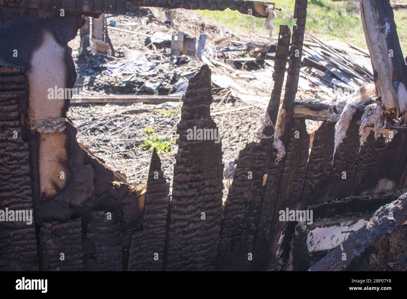 Natural fire ashes with dark grey black coals texture. It is a ...