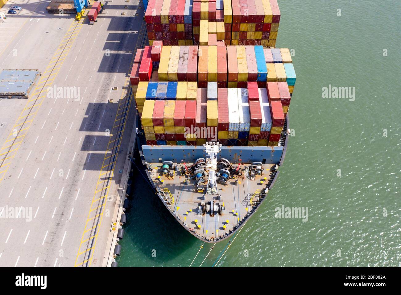 Large loaded Container Ship docked at a commercial port Stock Photo - Alamy