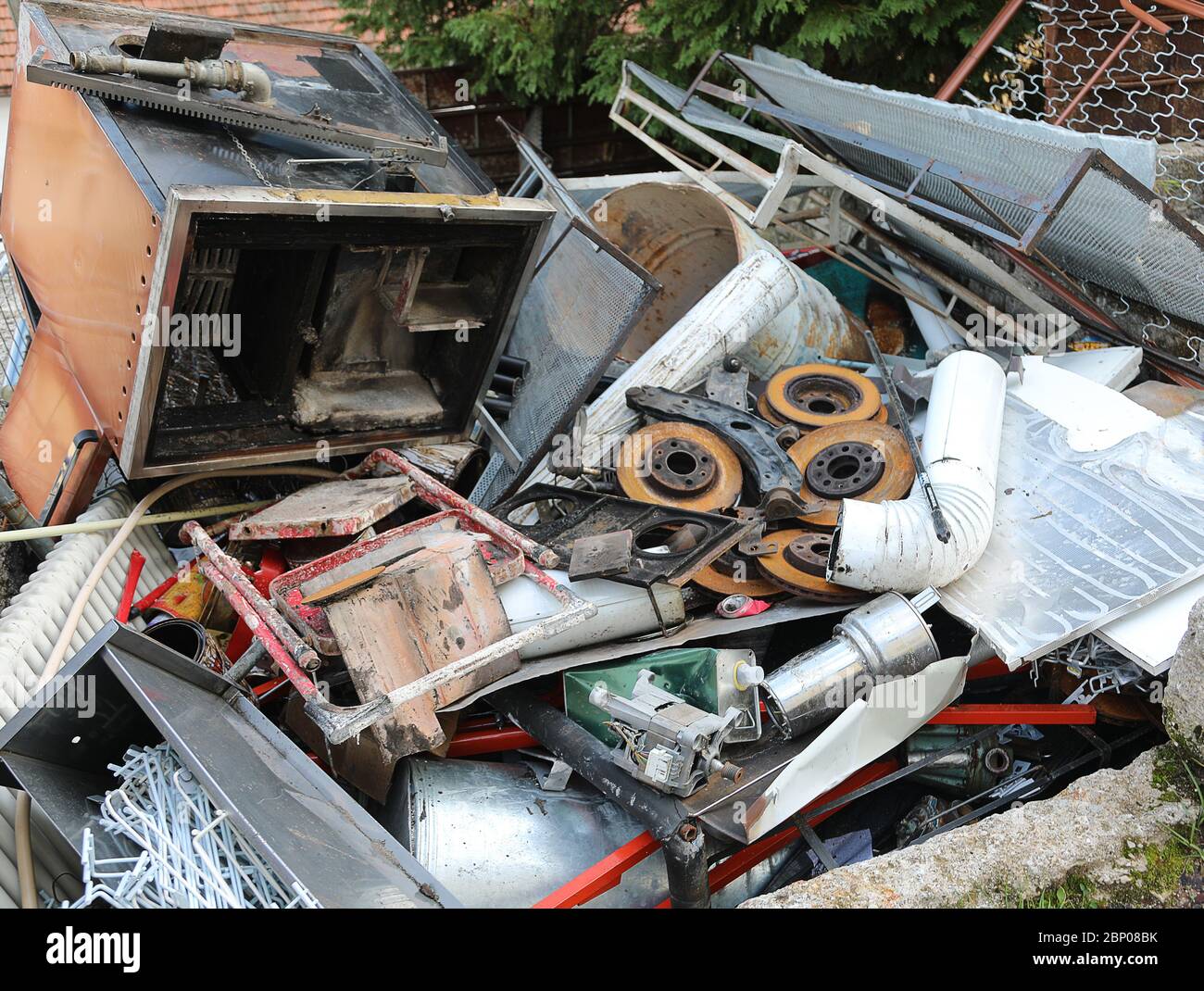 dump of ferrous material and many rusty pieces in the container of the ...