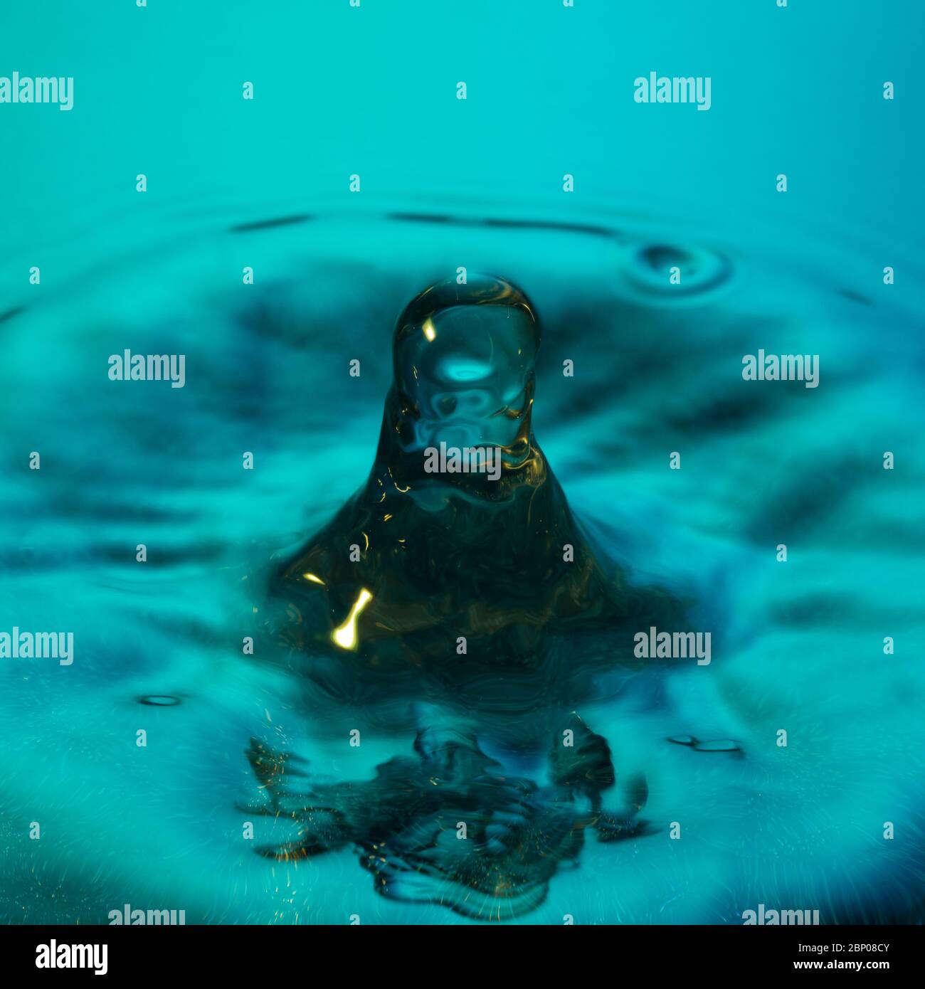 Water droplets photographed at high speed to freeze action Stock Photo ...