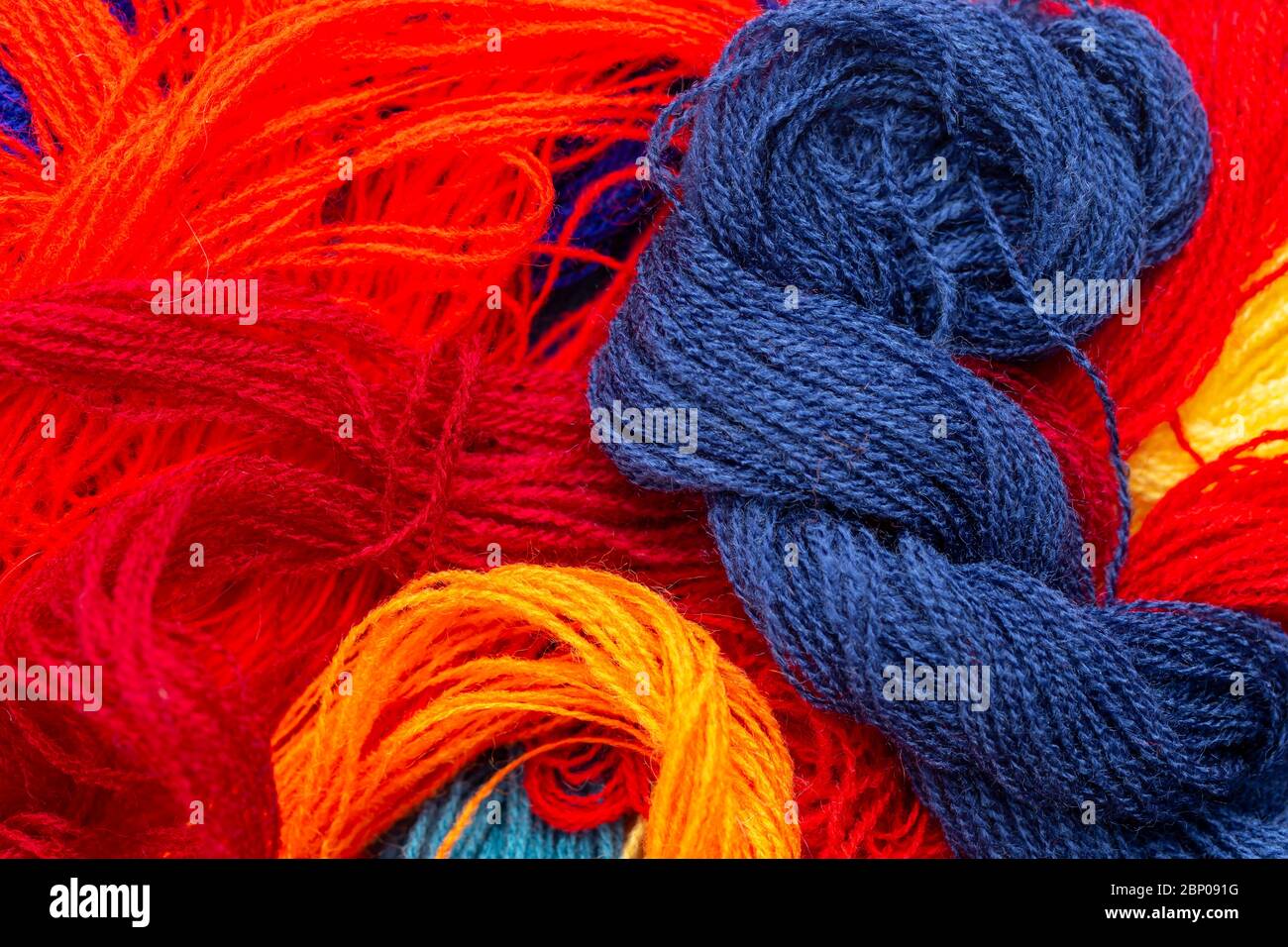 acrylic multi-colored threads for embroidery as a background ...