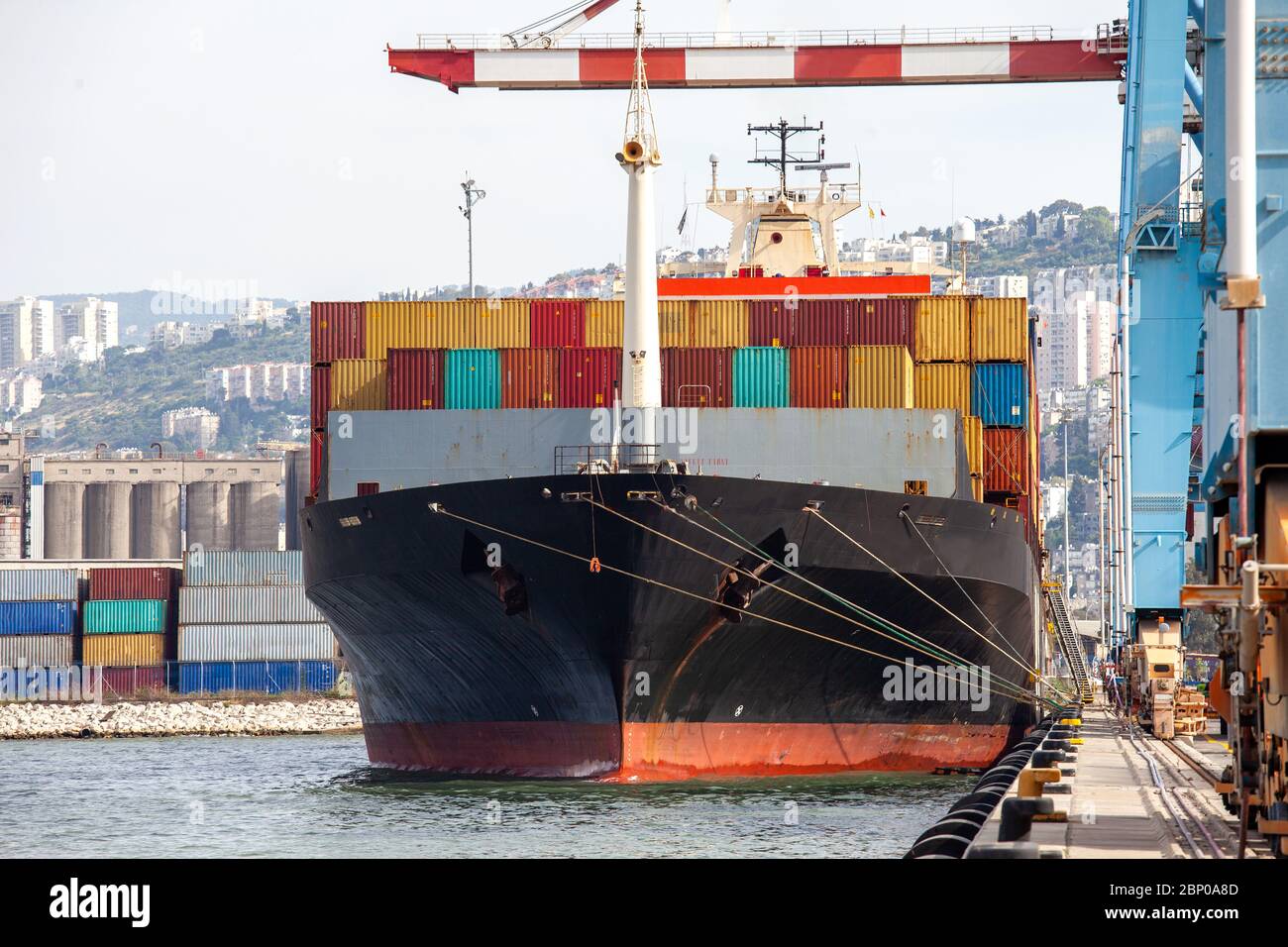 Large loaded Container Ship docked at a commercial port Stock Photo - Alamy