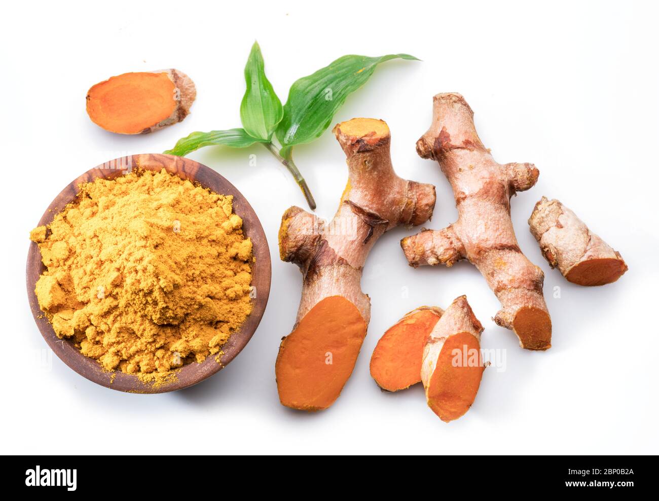 Fresh turmeric rhizome and turmeric powder isolated on white background ...