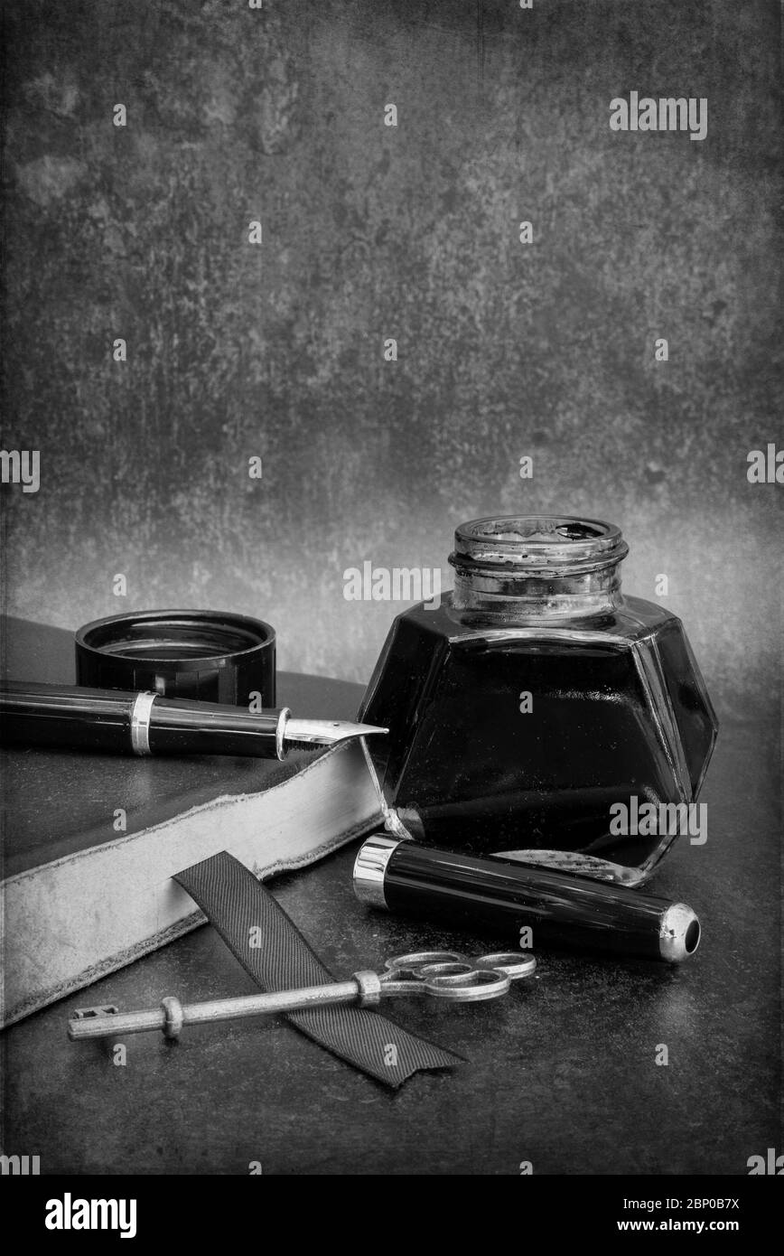 Romantic old vintage still life image of writing paraphrenalia ...