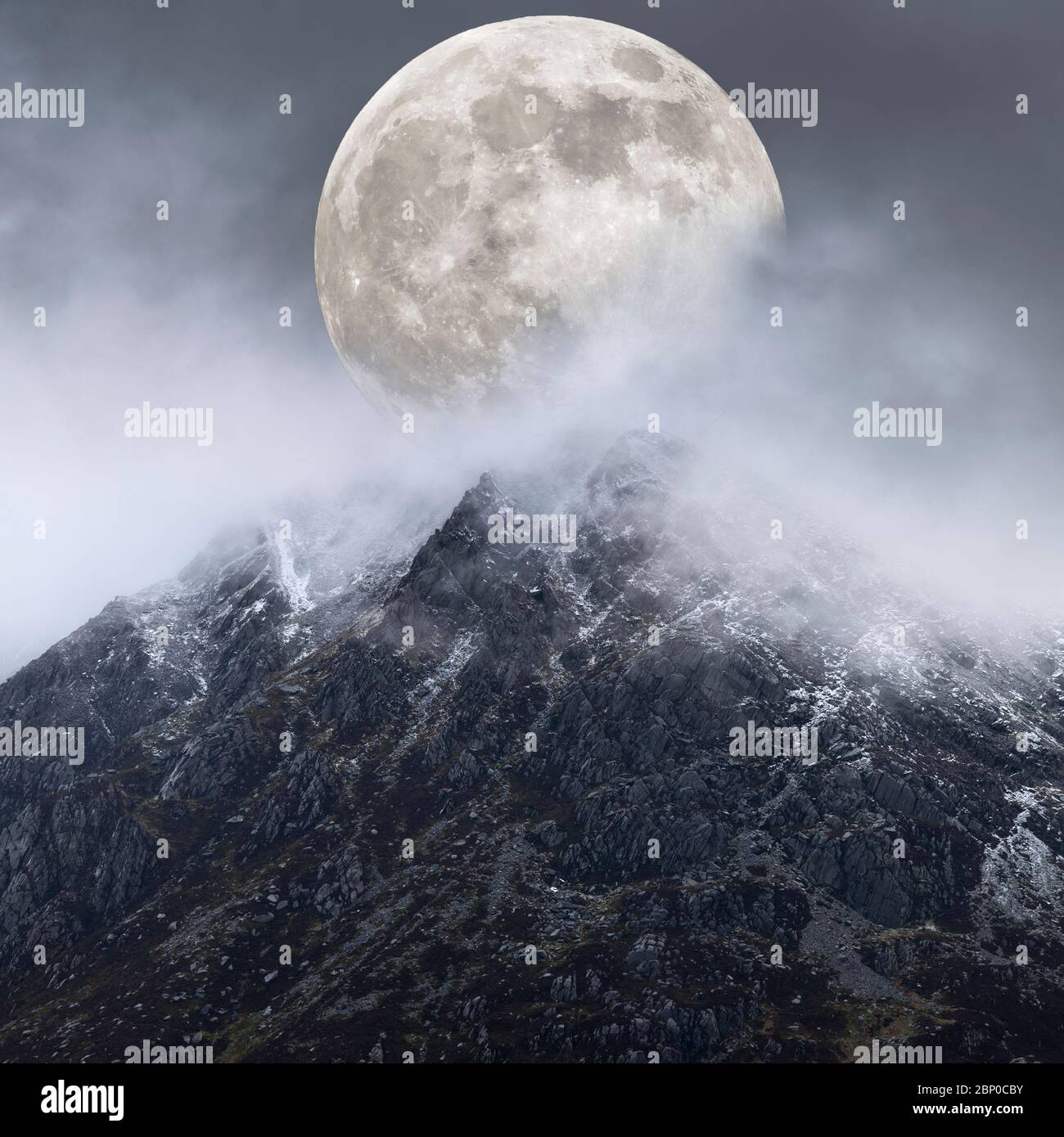Beautiful digital composite image of Supermoon above mountain range ...