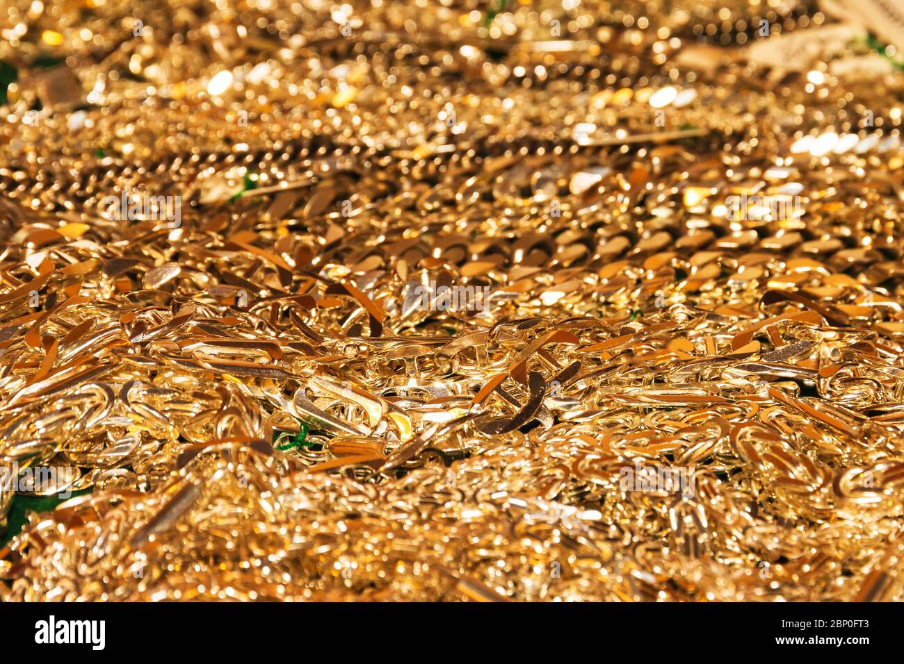 A collection of different types of heavy golden chains Stock Photo - Alamy