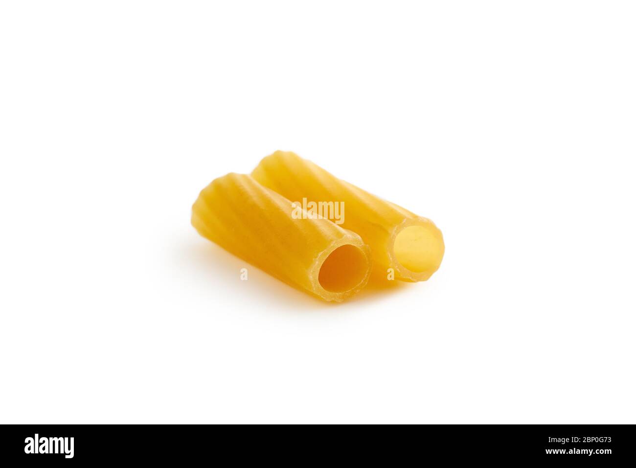 Italian raw dry pasta rigatoni isolated on white background Stock Photo ...
