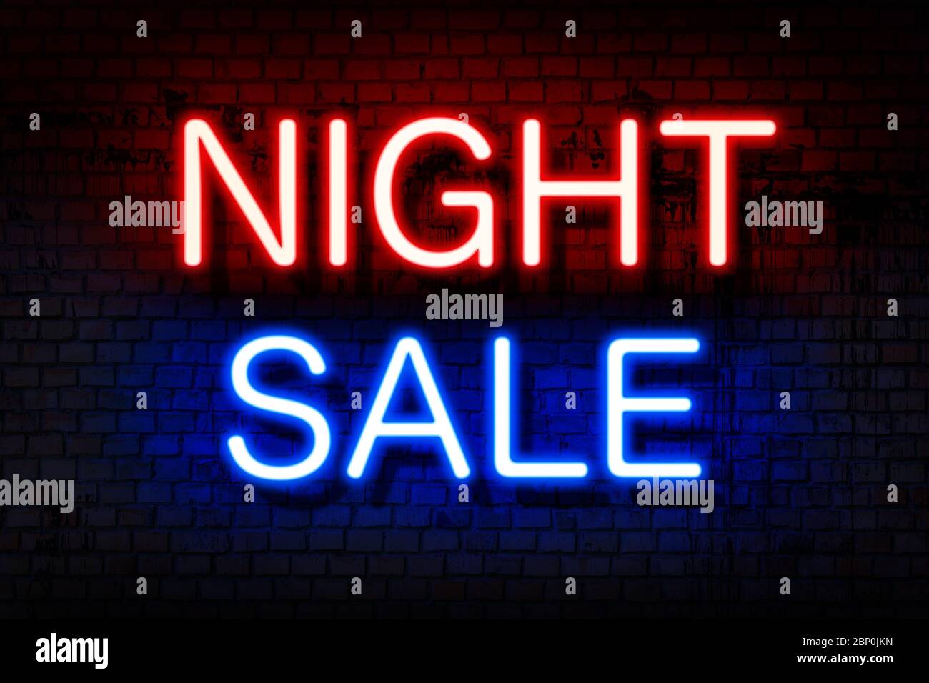 Night sale. Neon sign with luminous letters of red and blue on a black ...