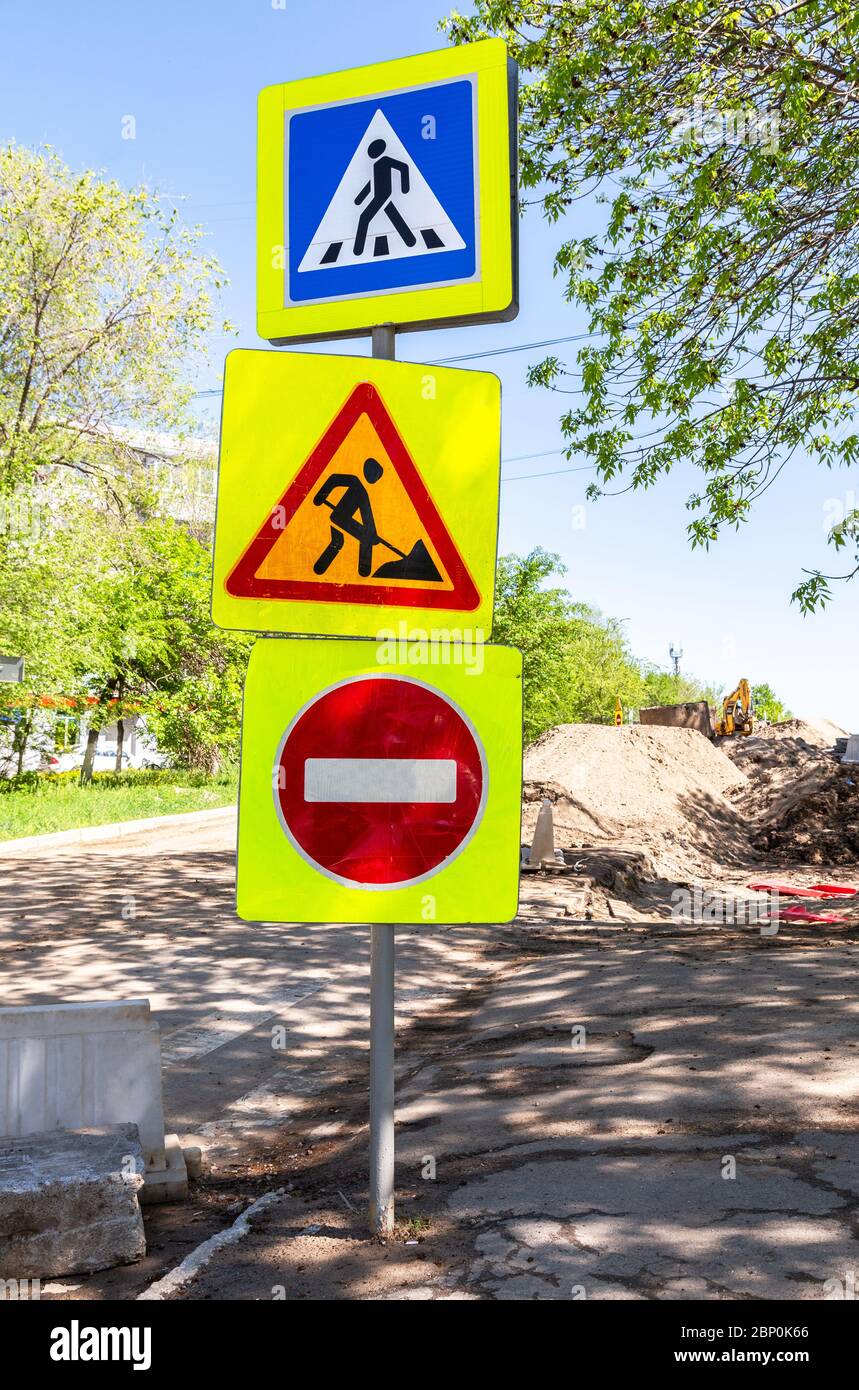 Road signs at the construction site of replacement underground ...