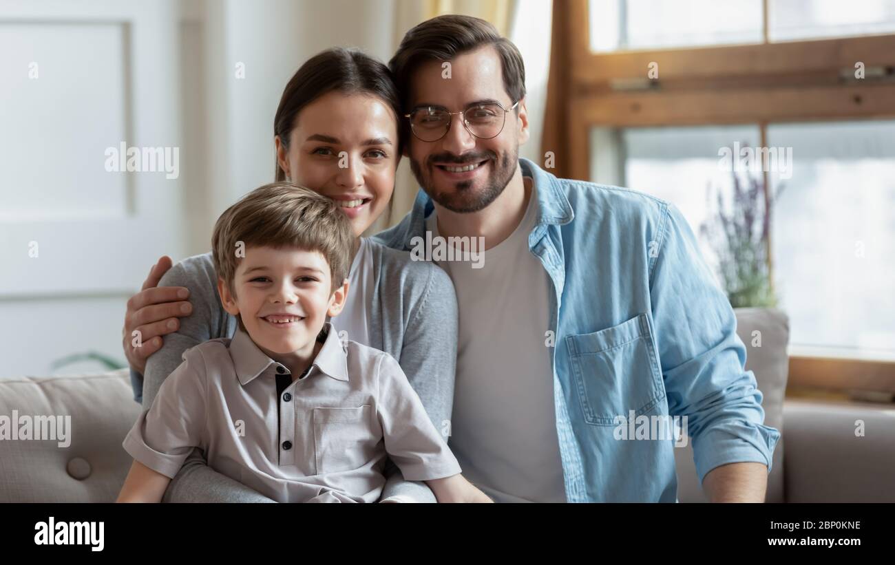 Portrait of happy family with little son at home Stock Photo - Alamy