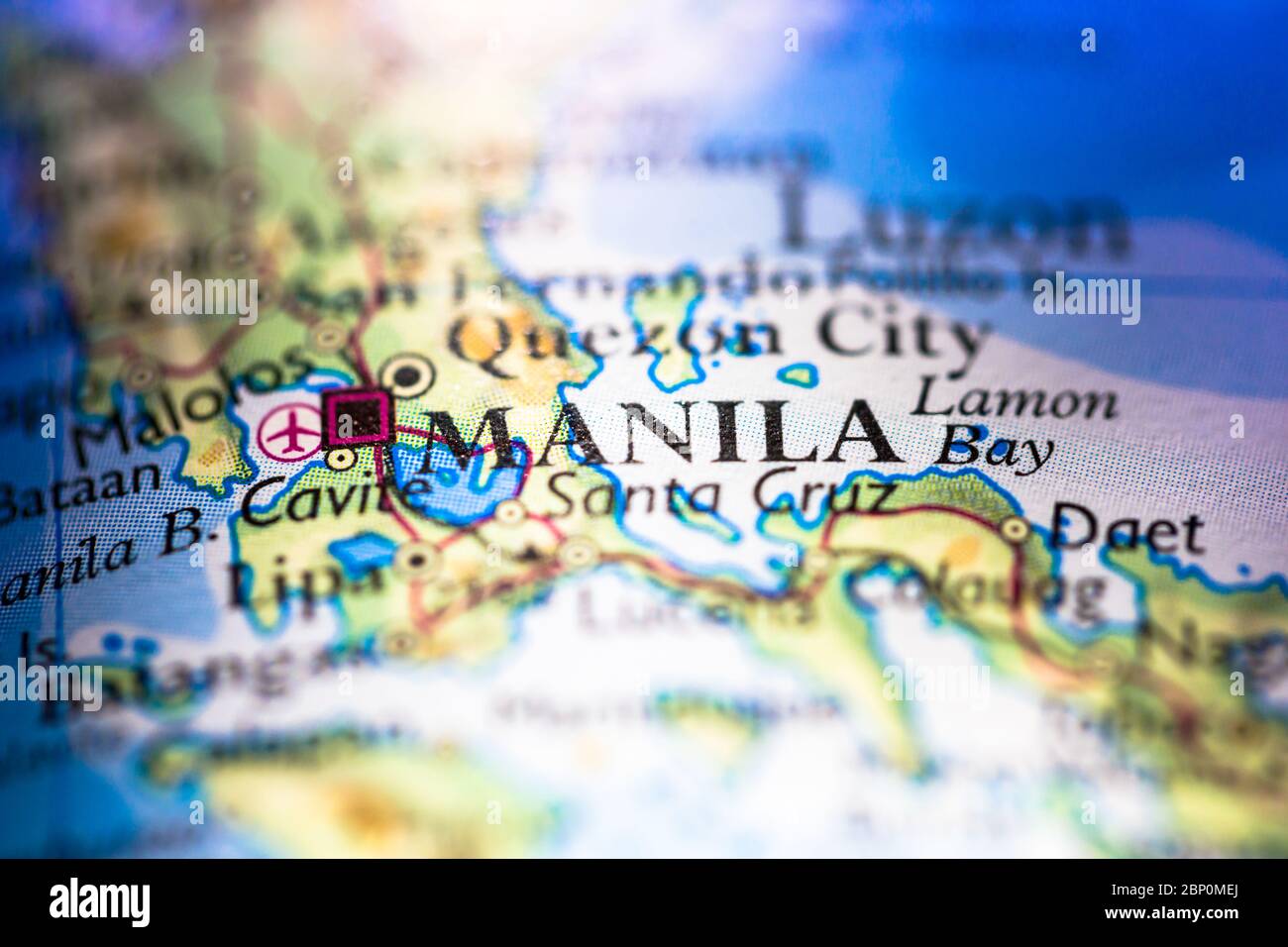 Shallow depth of field focus on geographical map location of Manila ...