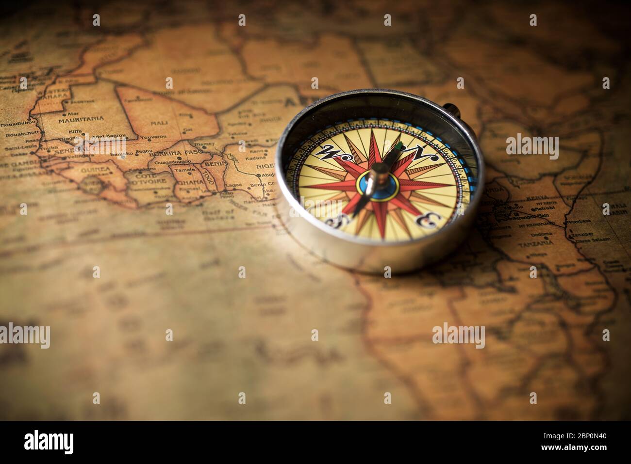 Vintage compass and old navigation map Stock Photo - Alamy
