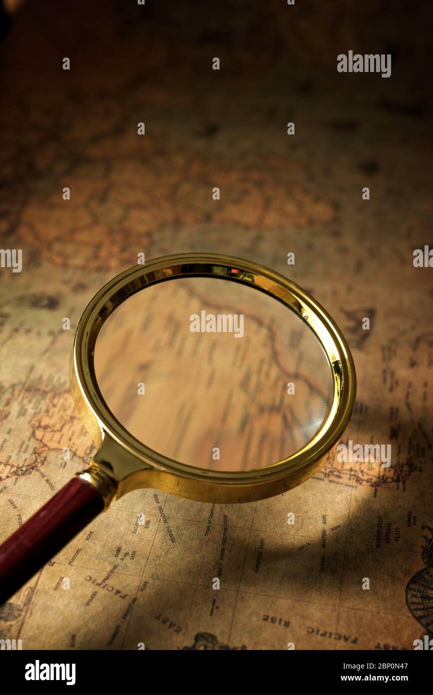 Magnifying glass old map hi-res stock photography and images - Alamy