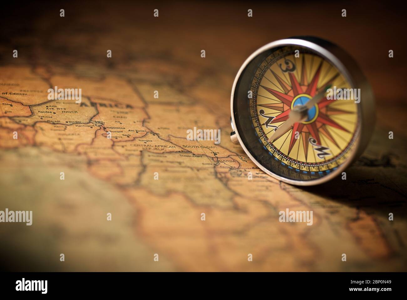Vintage compass and old navigation map Stock Photo - Alamy