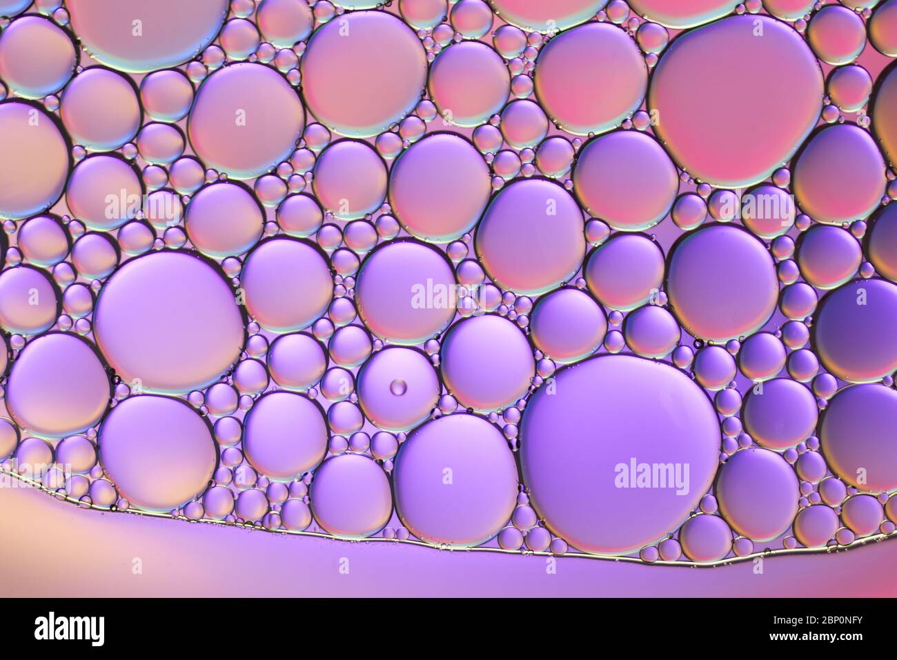 Colorful artistic of oil drop floating on the water Stock Photo - Alamy