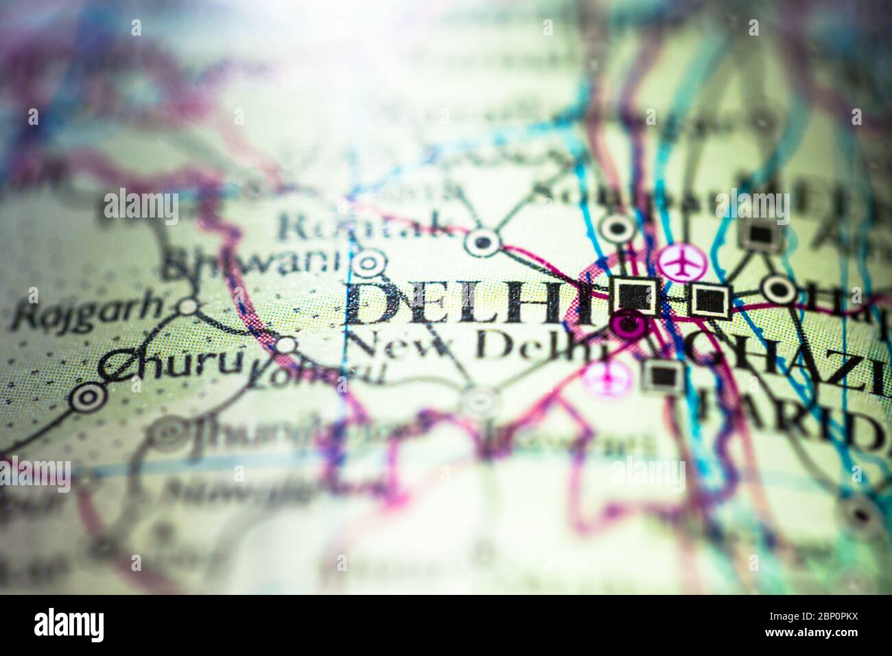 Shallow depth of field focus on geographical map location of New Delhi ...