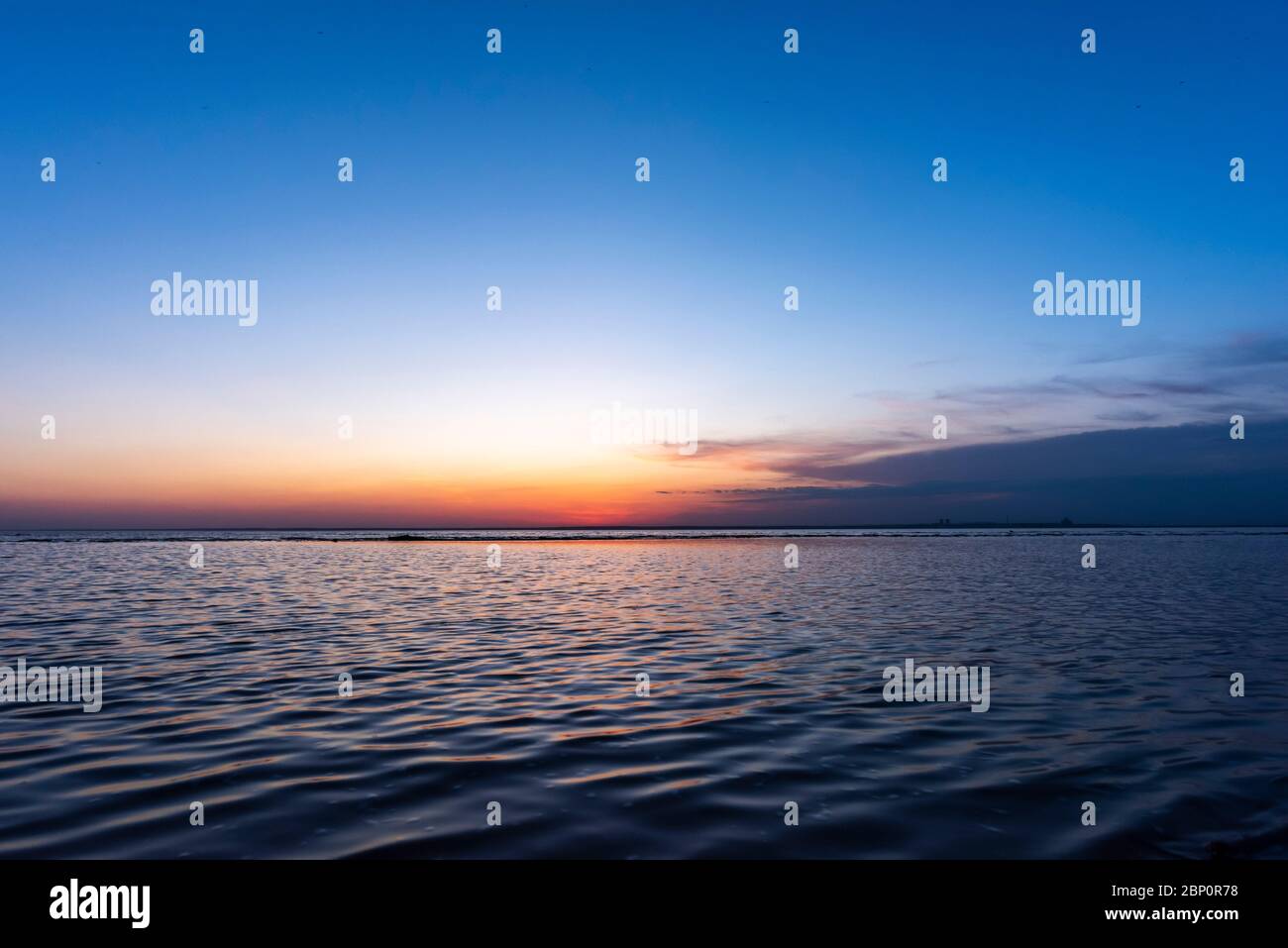 Nice sunset scene over sea Stock Photo - Alamy