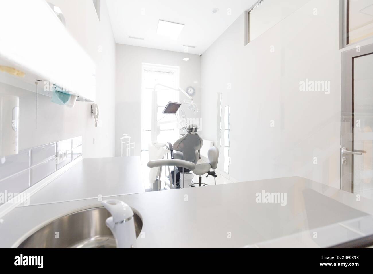 White dentistry room with professional equipment and tools for tooth ...