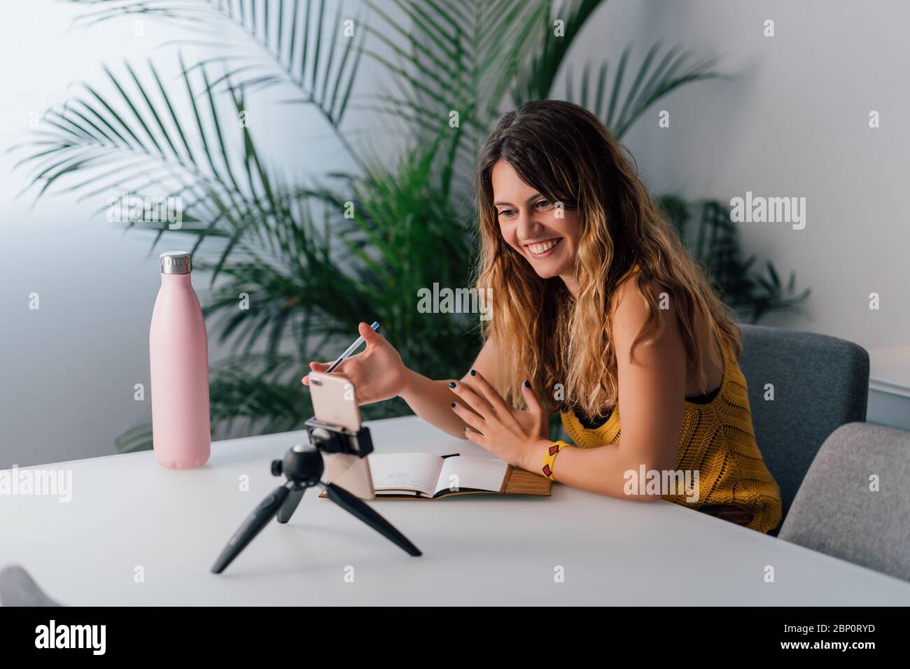 Woman making a phone call at home hi-res stock photography and images ...