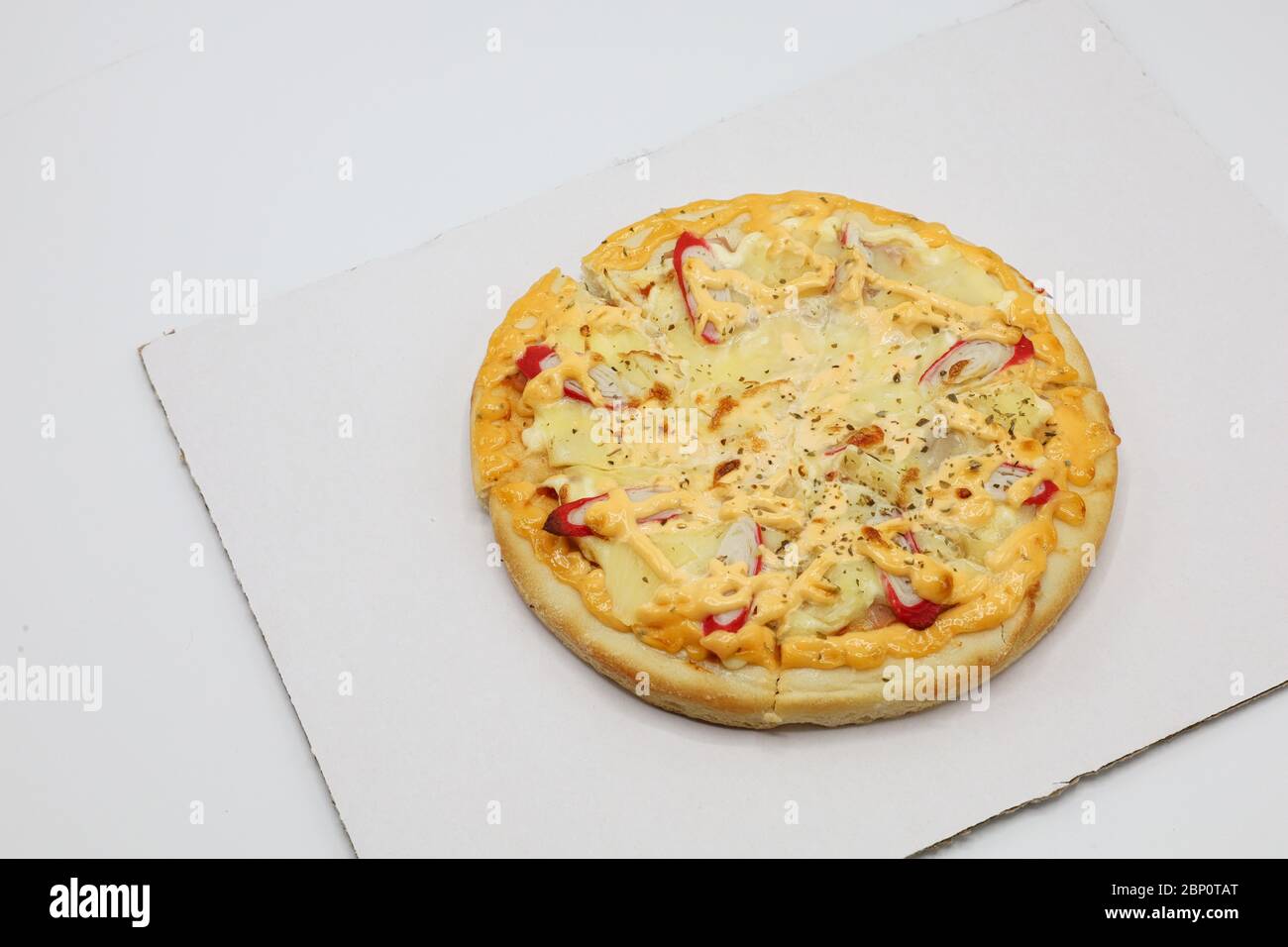 Pizza with chicken and sausage isolated on white background Stock Photo ...