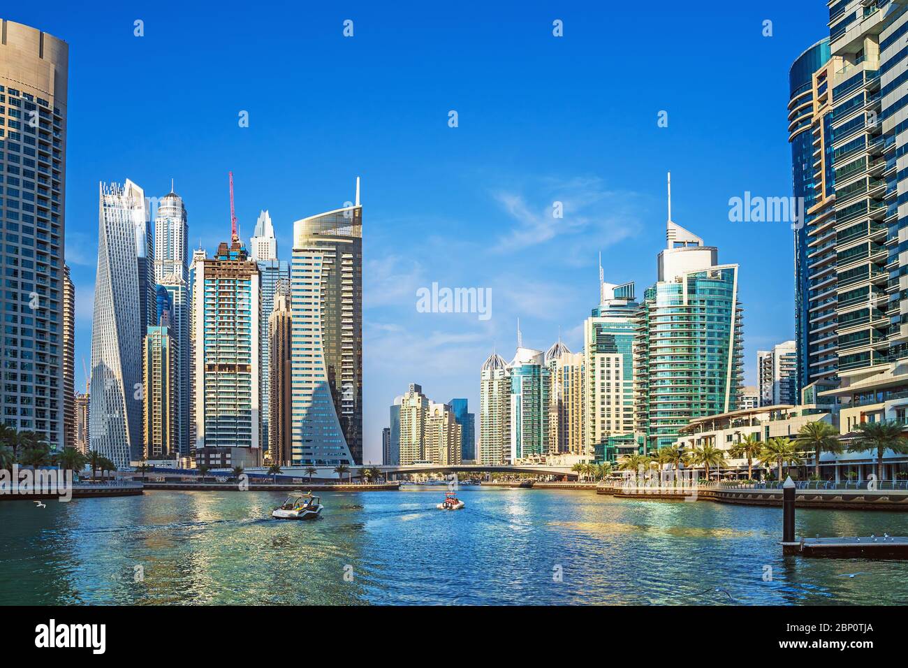 Dubai Marina canal with azure water and high rise buildings, United ...