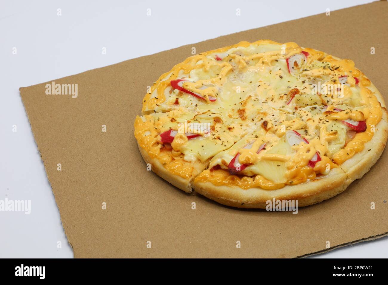 Pizza with chicken and sausage isolated on white background Stock Photo ...