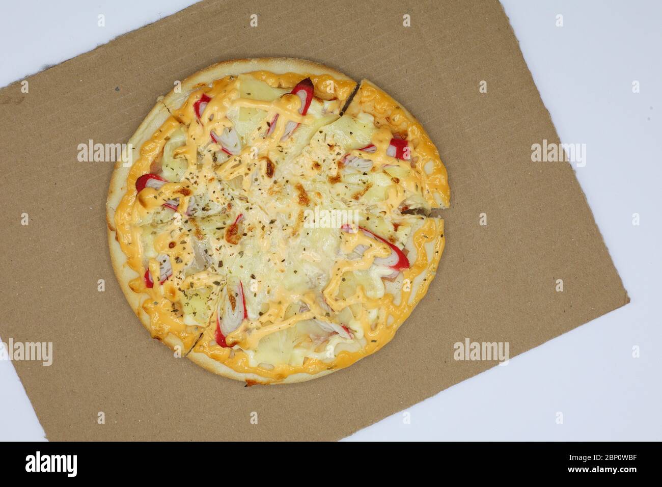 Pizza with chicken and sausage isolated on white background Stock Photo ...