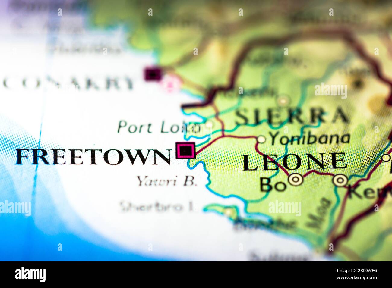 Shallow depth of field focus on geographical map location of Freetown ...