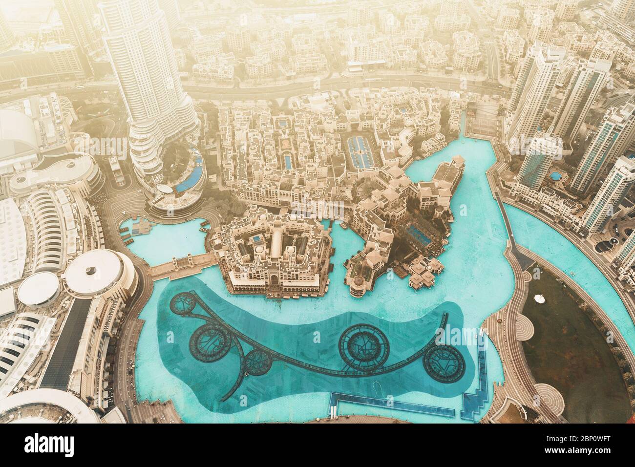 Aerial view Dubai downtown with many buildings and pool dancing ...