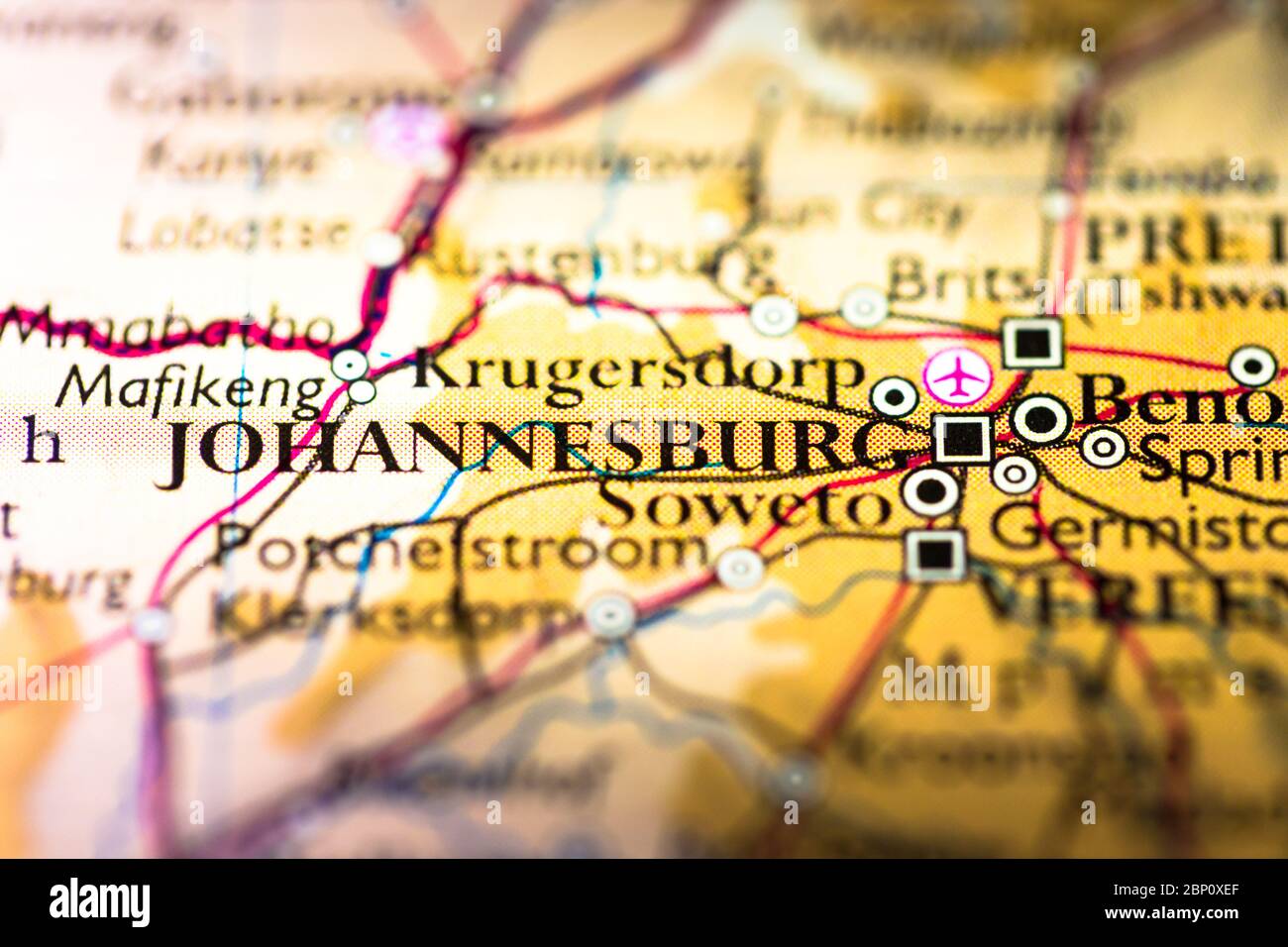 Shallow depth of field focus on geographical map location of ...