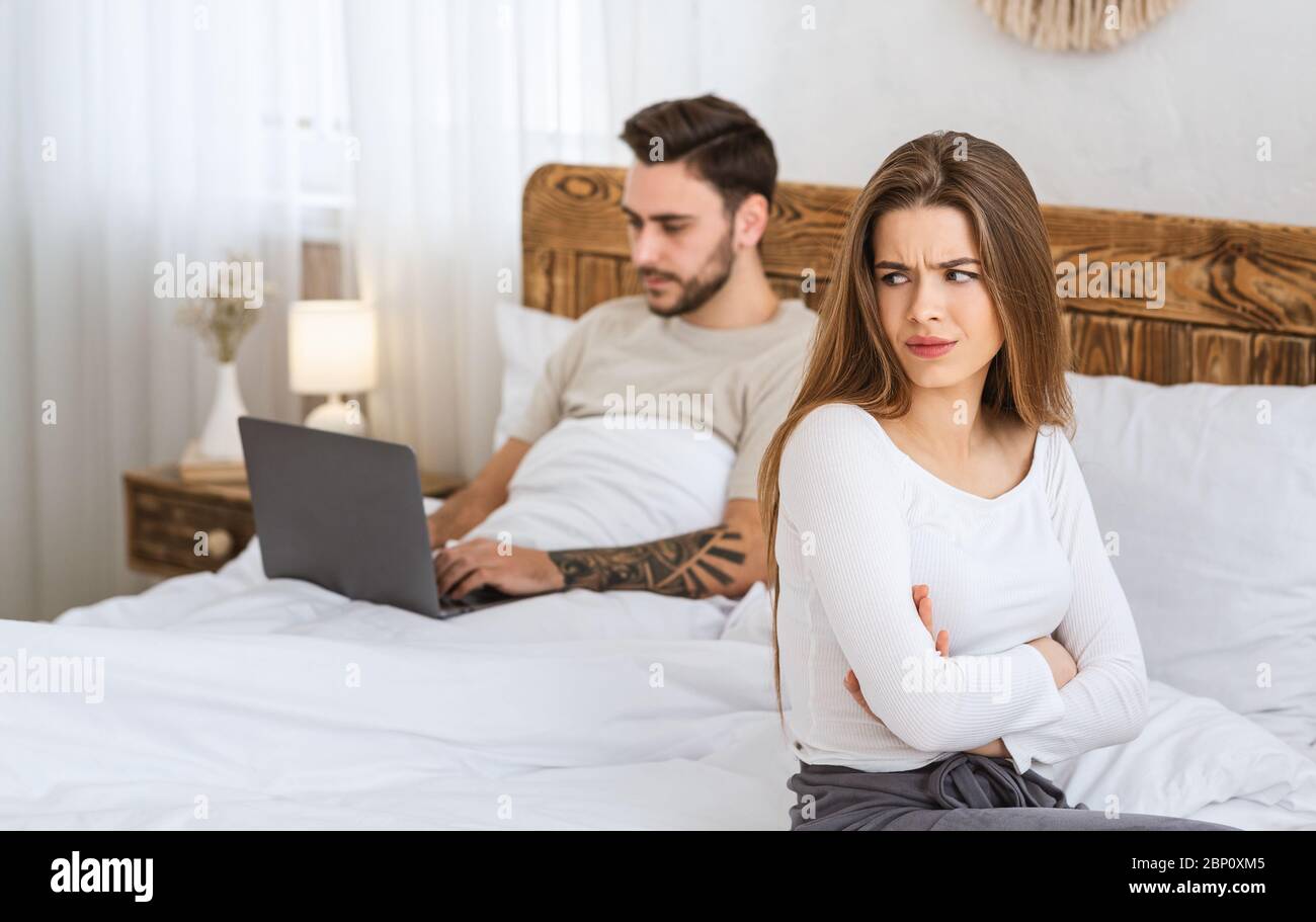 Woman watching man work hi-res stock photography and images - Alamy
