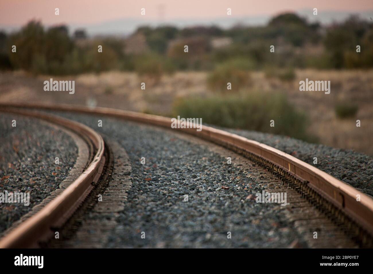 train track with perspective from the ground Stock Photo - Alamy