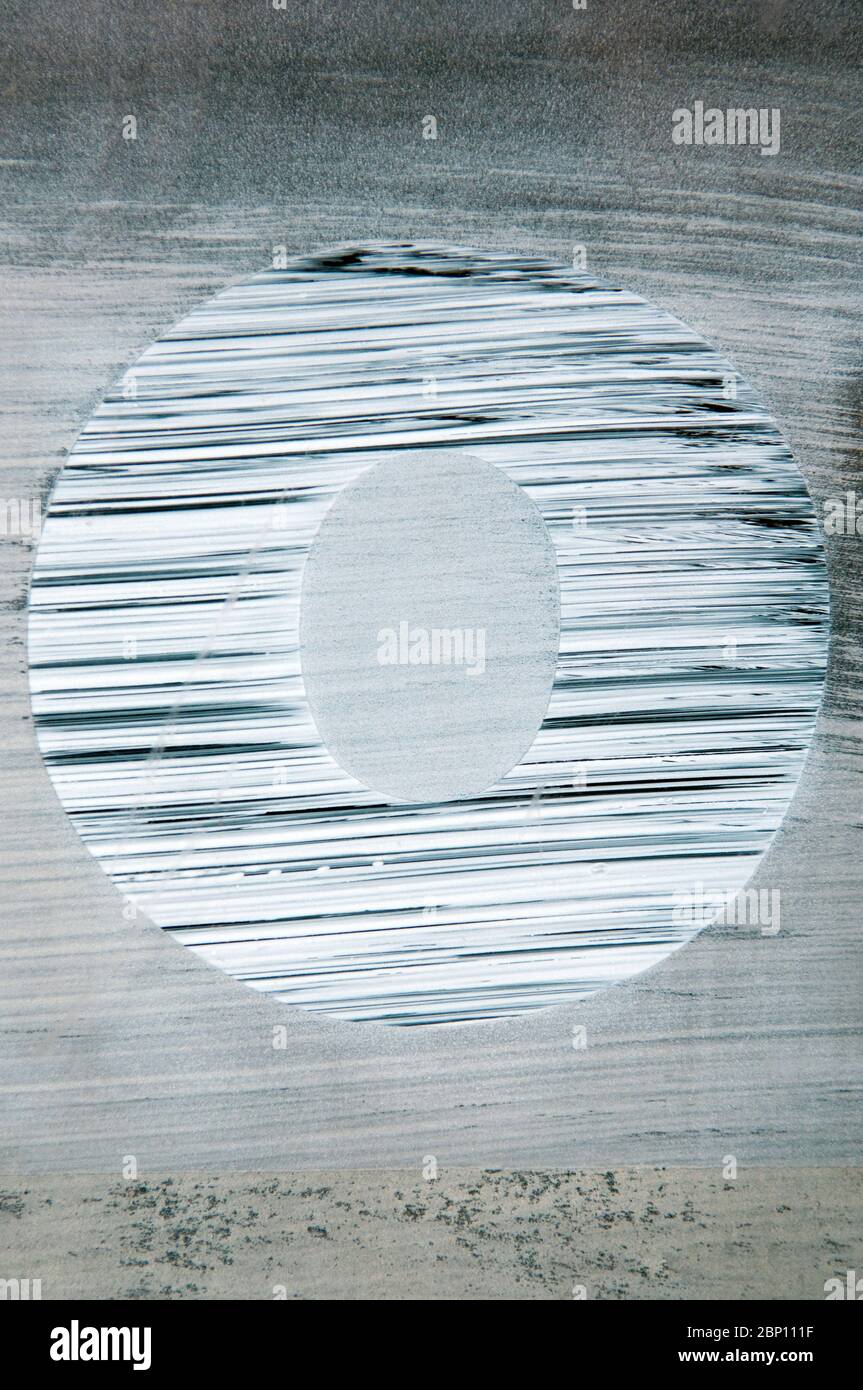 The Letter O Attached To The Surface Of A Window Stock Photo - Alamy