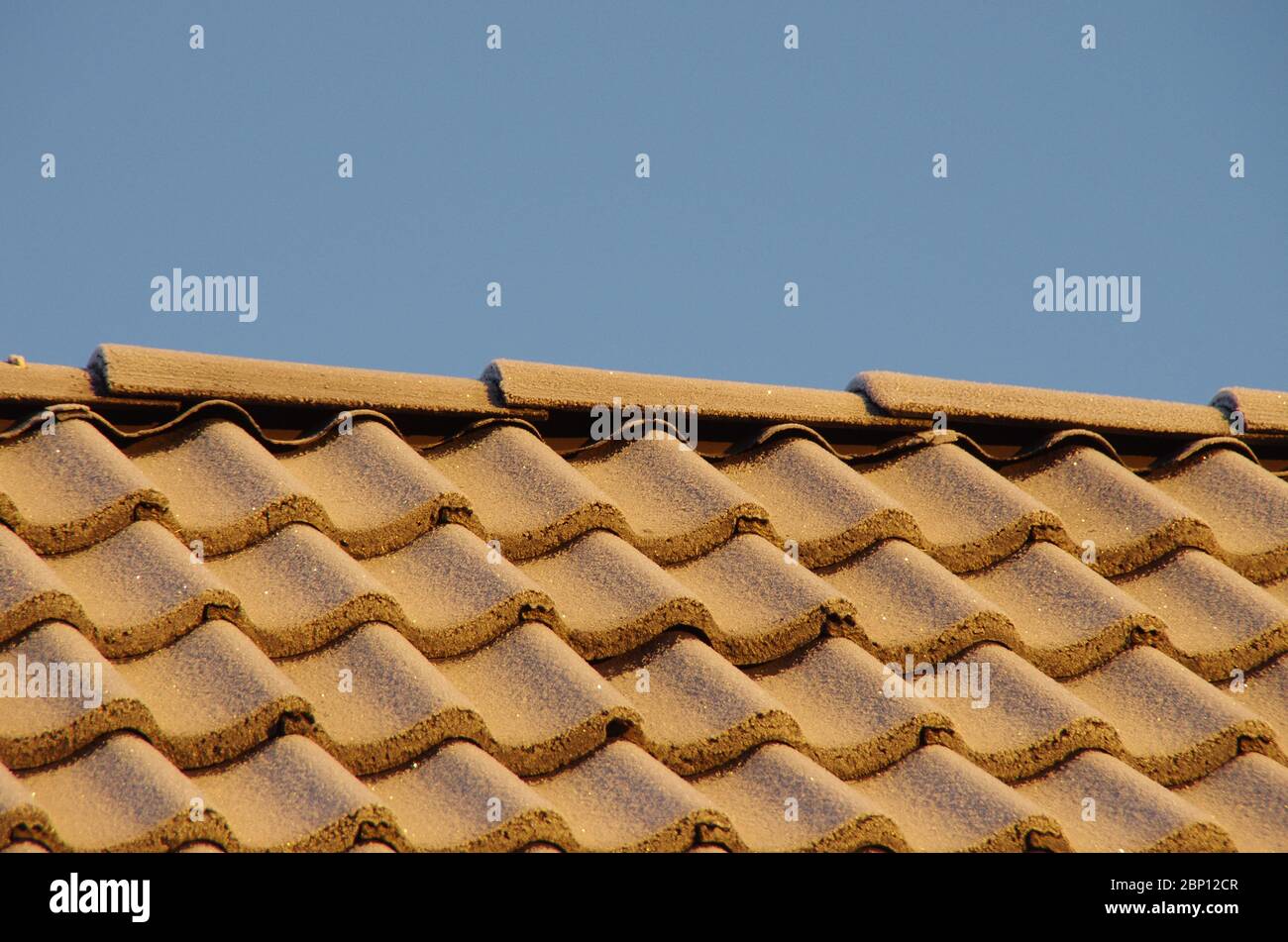 Clean tile roof Stock Photo - Alamy