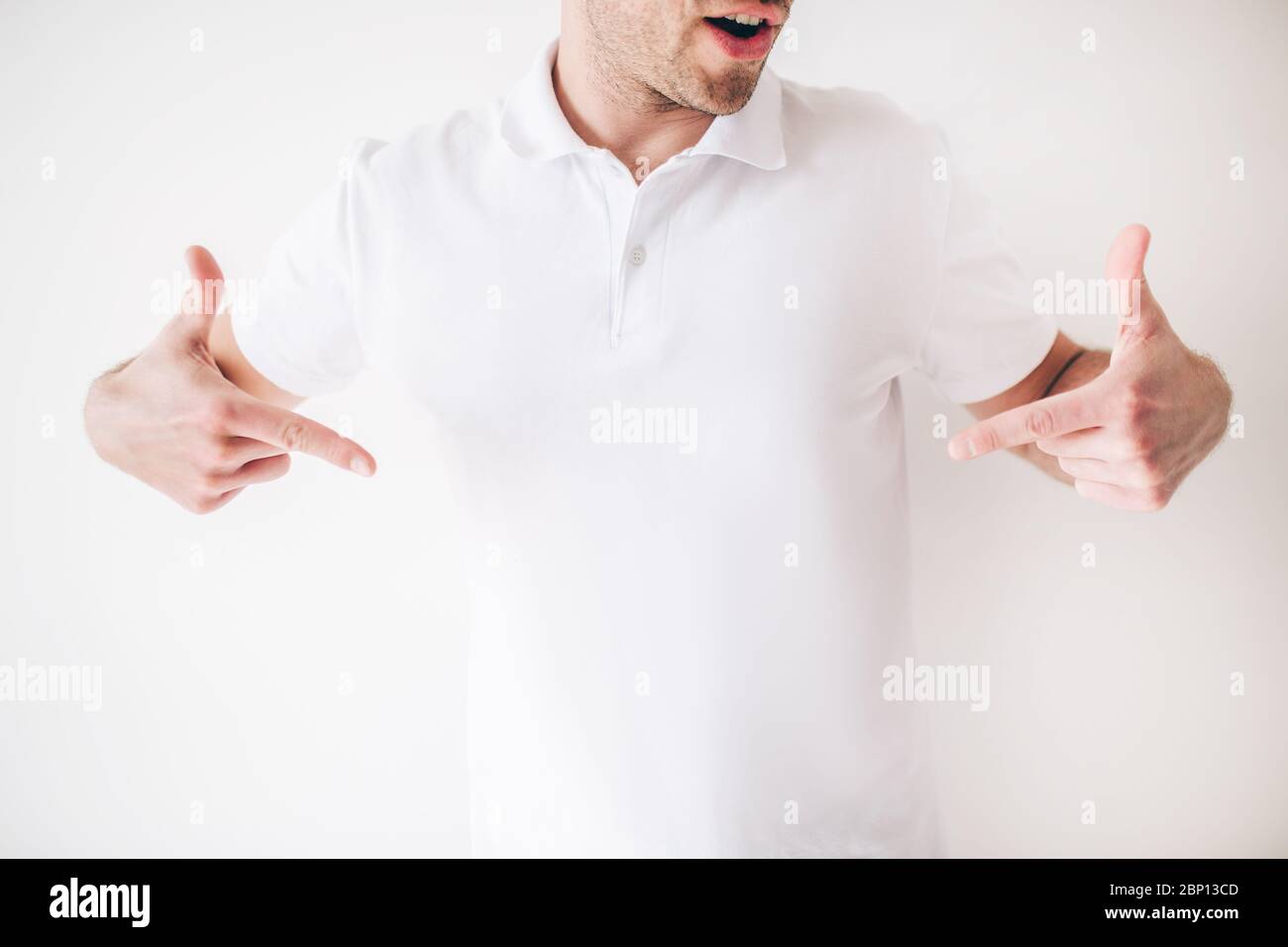 Young man isolated over white background. Cut view of cool confident ...