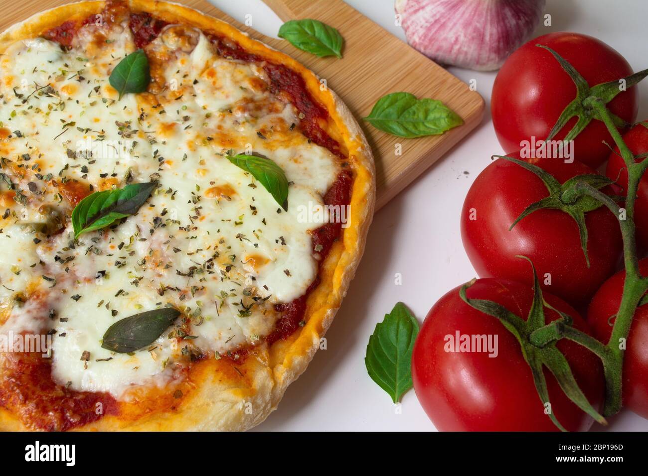 Homemade italian pizza napoletana with fresh tomato and garlic sauce ...