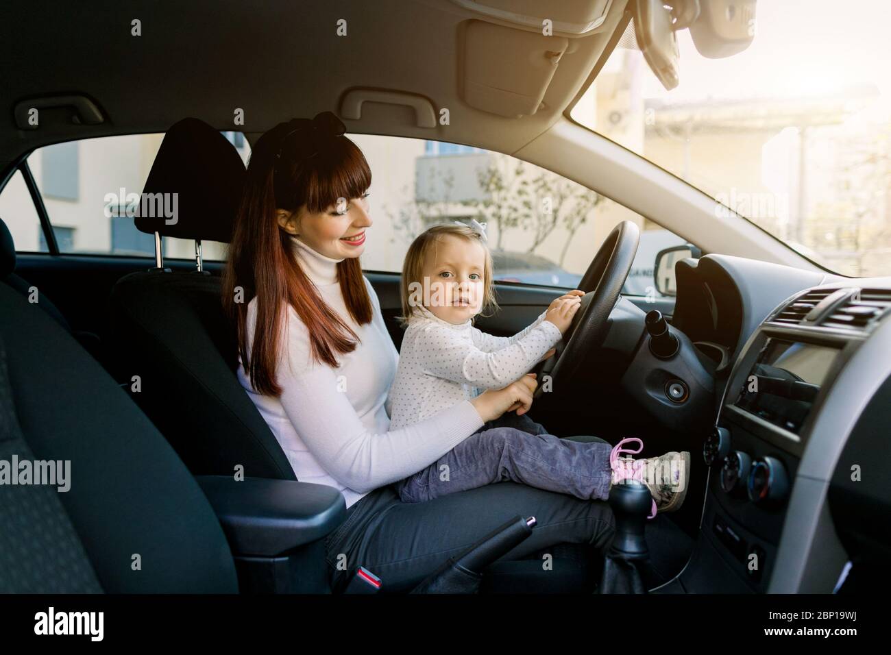 Mother baby driving in car hi-res stock photography and images - Alamy