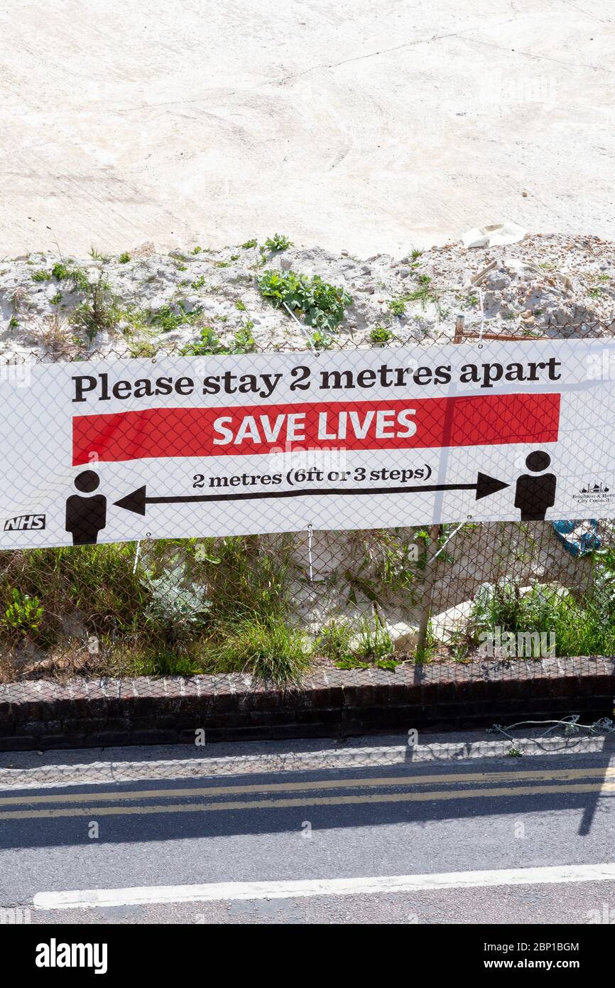 NHS save lives sign on beach Stock Photo - Alamy