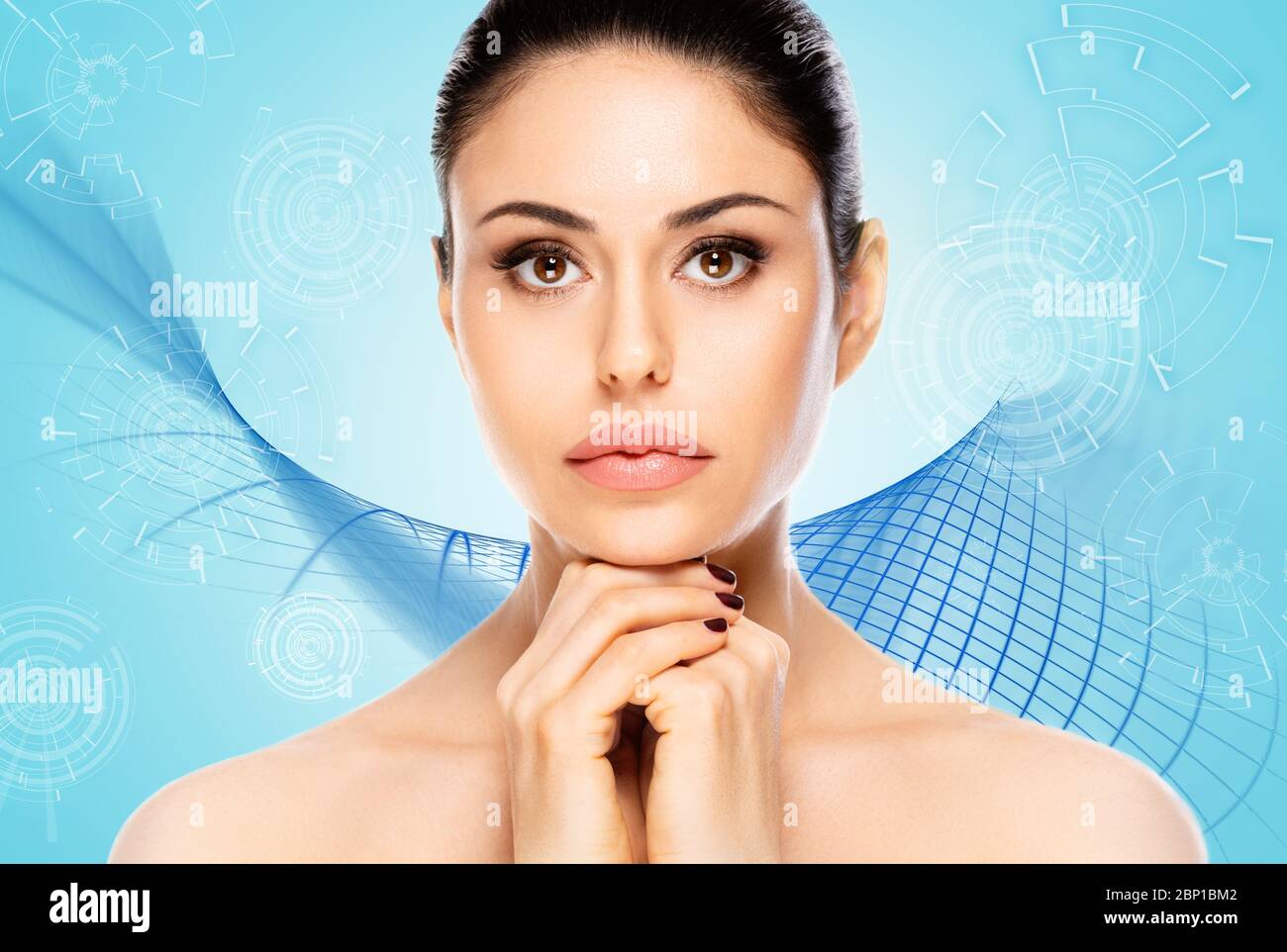 Beautiful woman face portrait on blue technology background Stock Photo ...