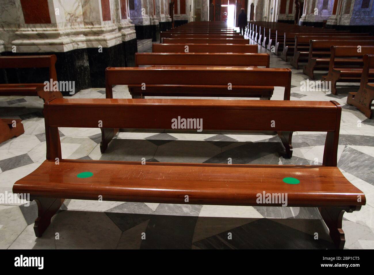 The signs placed on the benches of the church where the faithful can ...