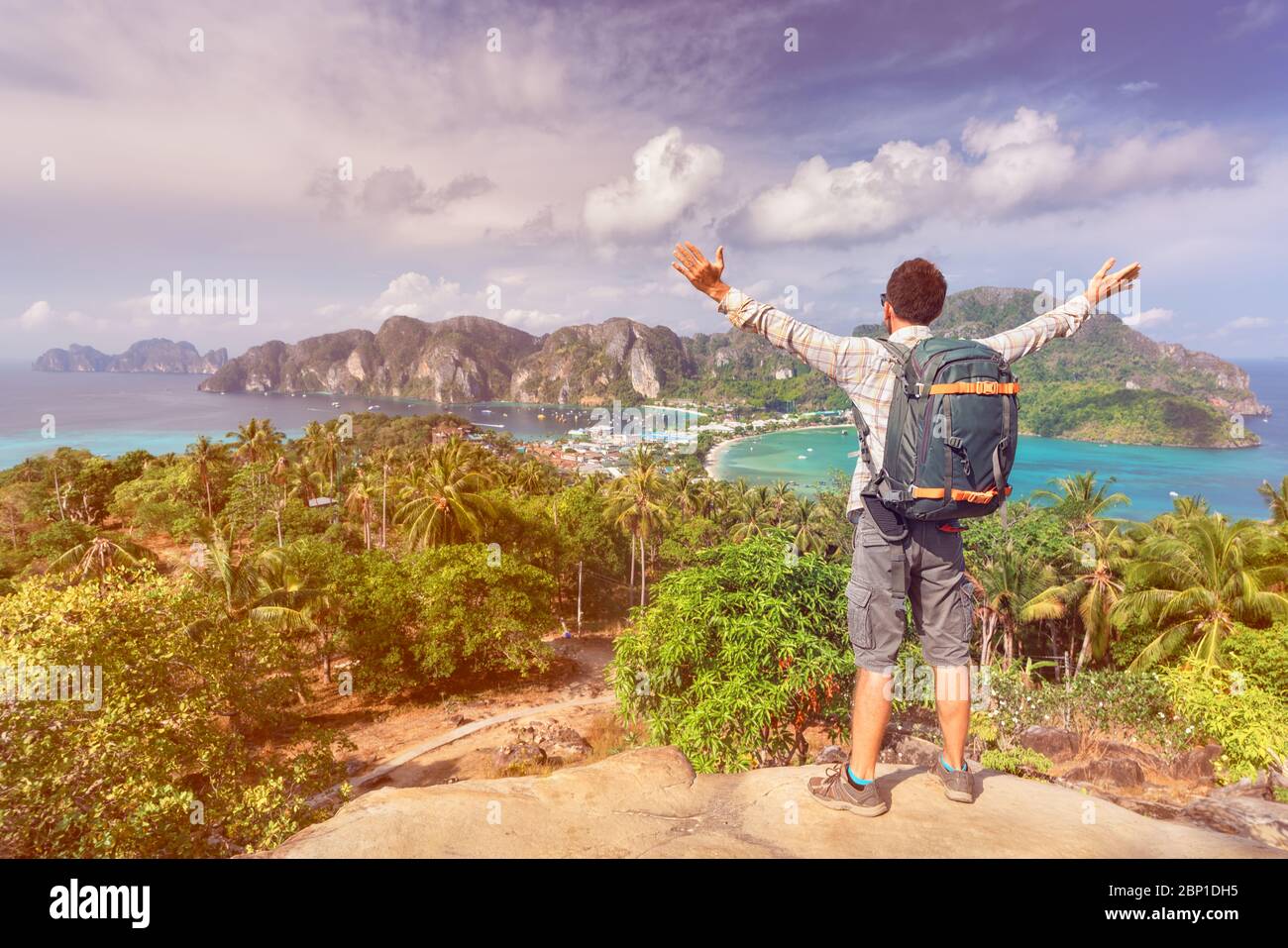 Man tourist with backpack on the mountain see the beautiful nature ...