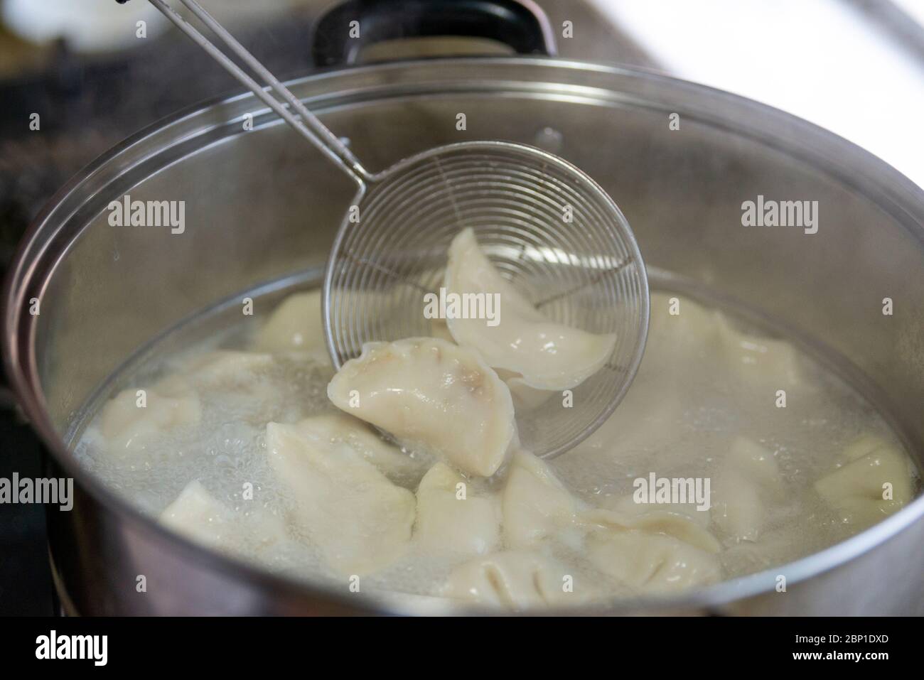 Yogurt pot hand hi-res stock photography and images - Alamy