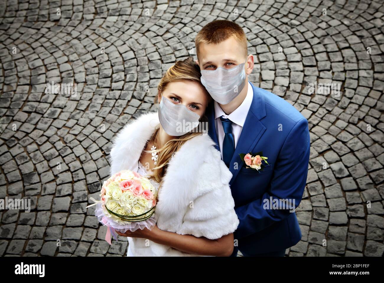 Newlyweds on the walk wear facial protective masks for respiratory ...